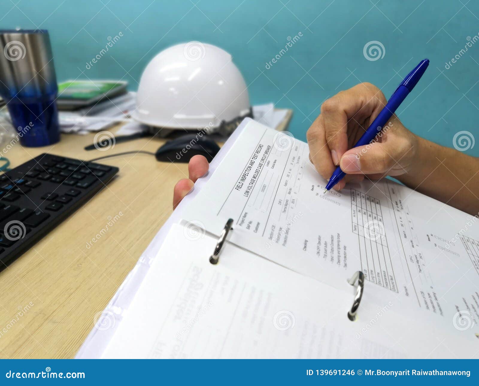 Engineer Inspecting and Checking Datasheet. Stock Photo - Image of ...