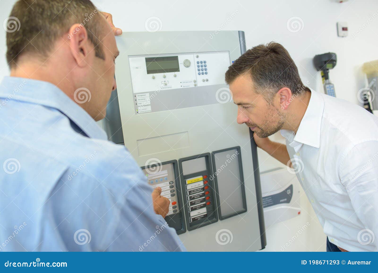 Engineers checking device stock image. Image of business - 198671293