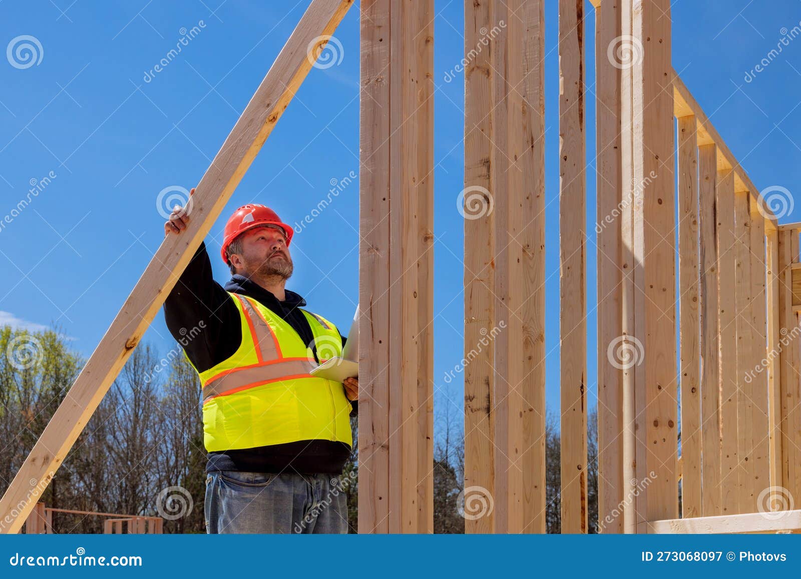 Engineers Checking the Leveling Quality of Wooden Beams Using a Level ...