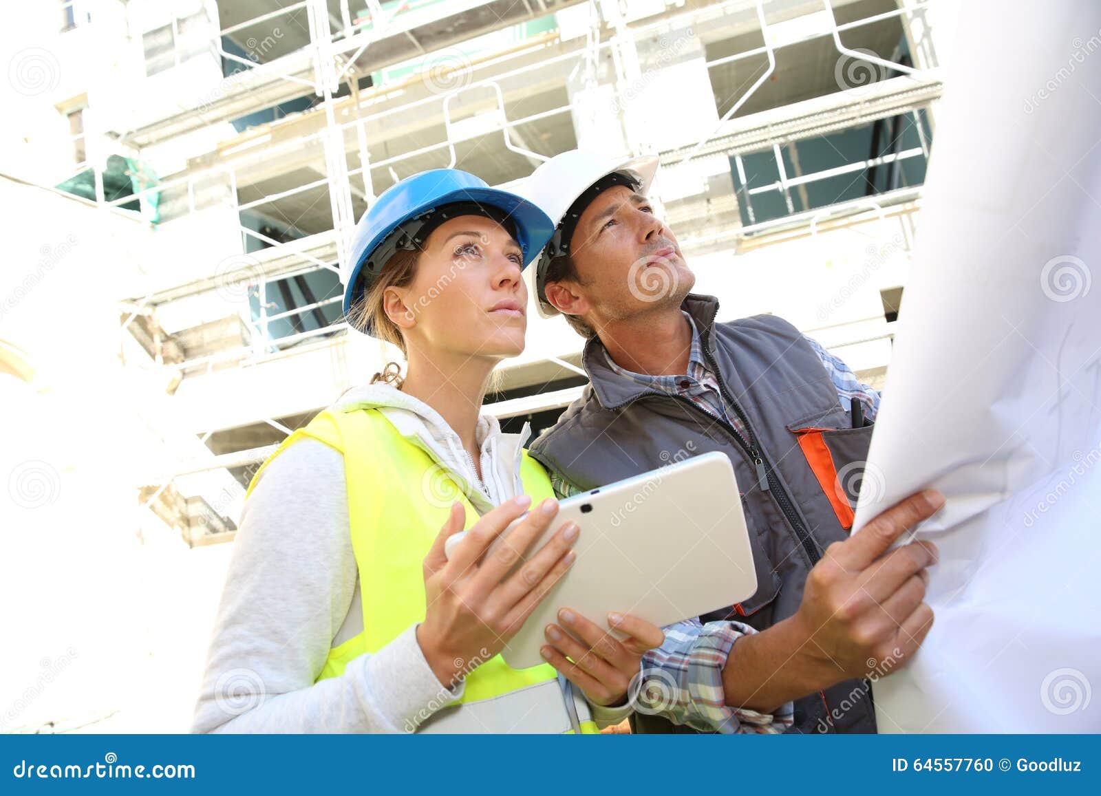 Engineers Checking Plan on Construction Site Stock Photo - Image of ...
