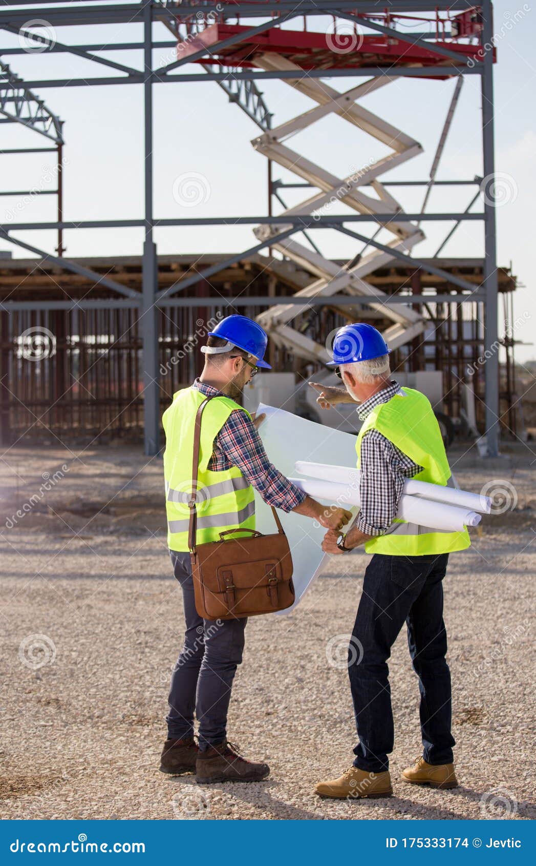 Engineers at Construction Site Stock Photo - Image of satisfied, site ...