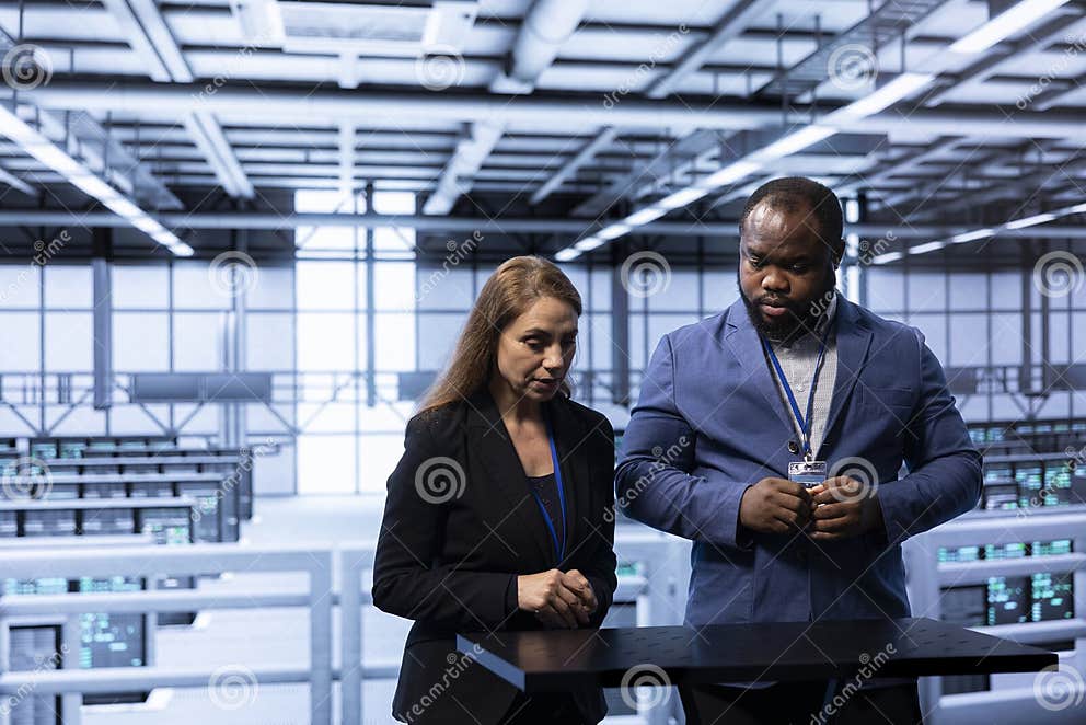 Engineers in Data Center Tracking Network Traffic Using Augmented ...