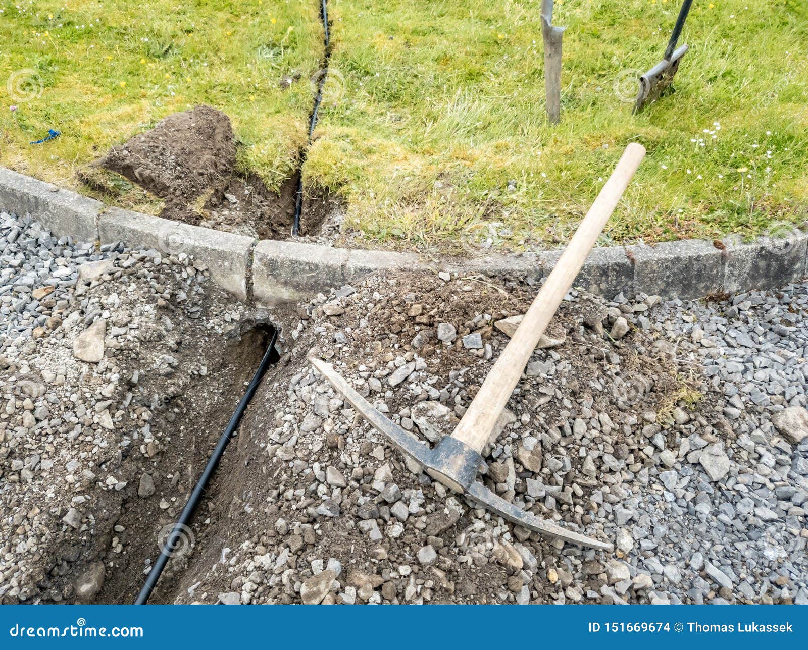 Engineers Digging a New Fibre Cable into the Ground Stock Photo - Image ...