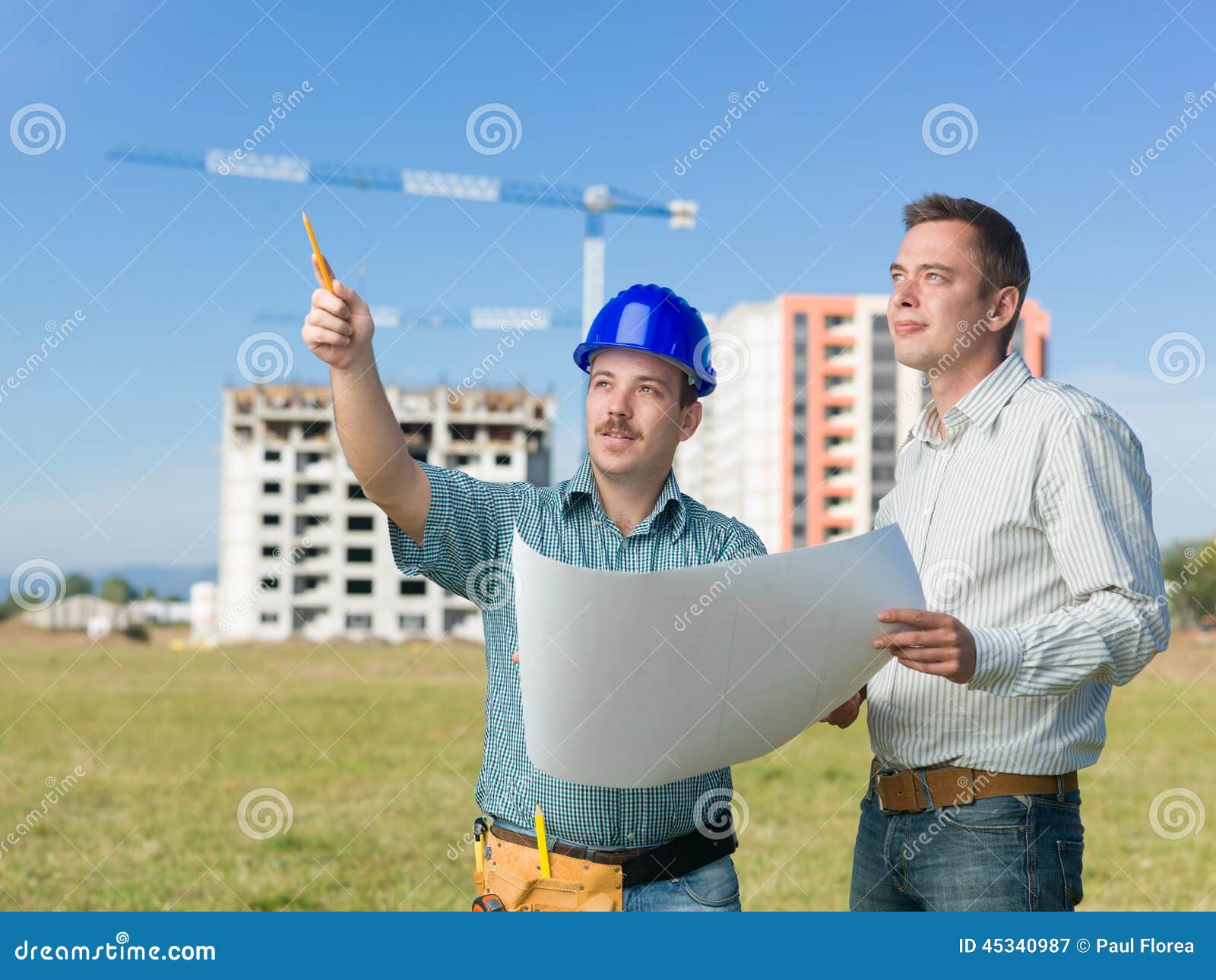 Engineers Discussing Building in Progress Stock Image - Image of ...