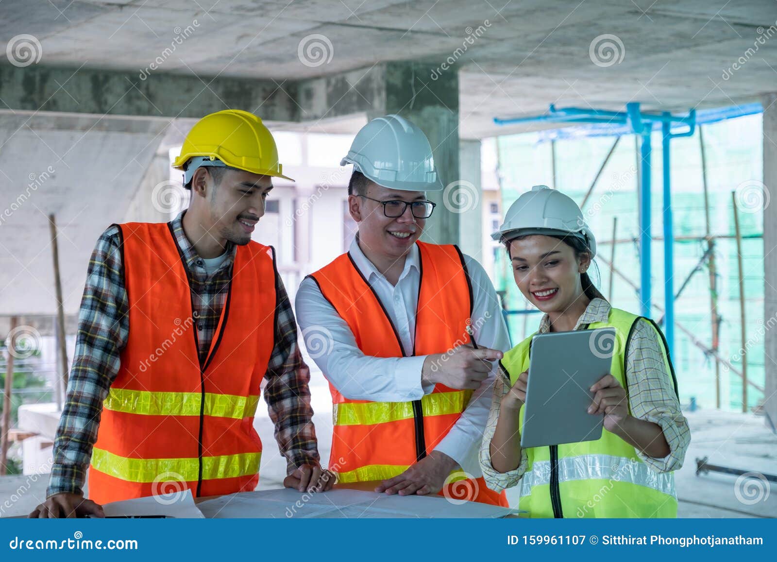 Engineers are Discussing at Building Site Stock Image - Image of ...