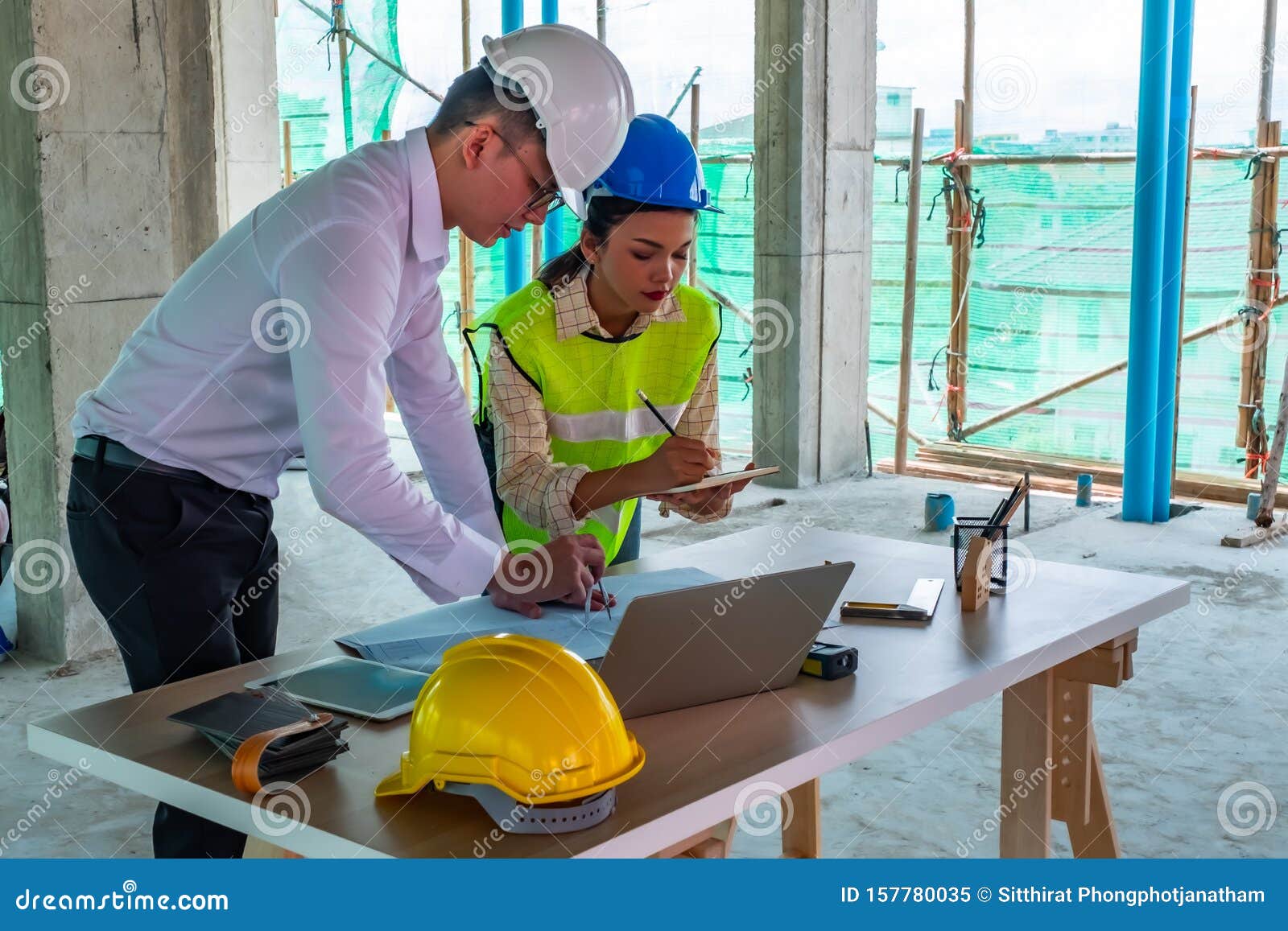 Engineers are Discussing at Building Site Stock Image - Image of ...