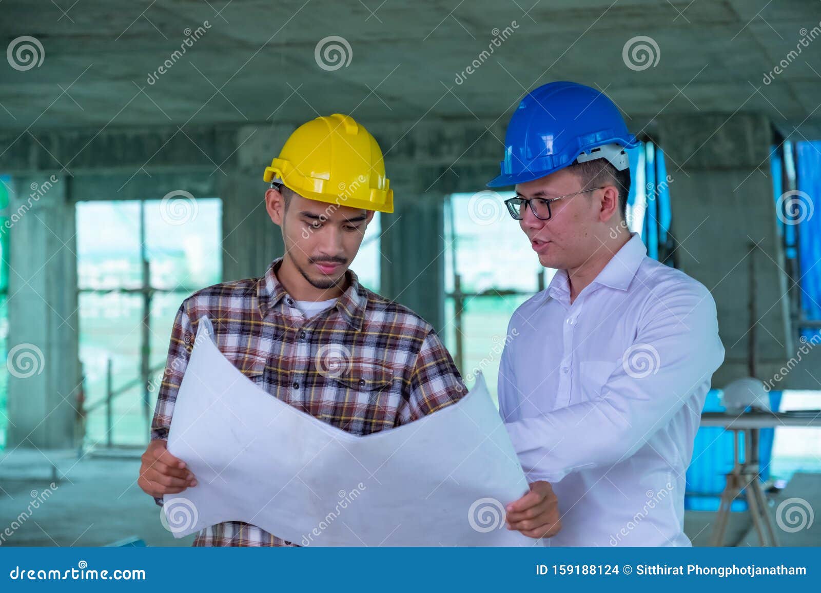 Engineers are Discussing at Building Site Stock Photo - Image of jacket ...