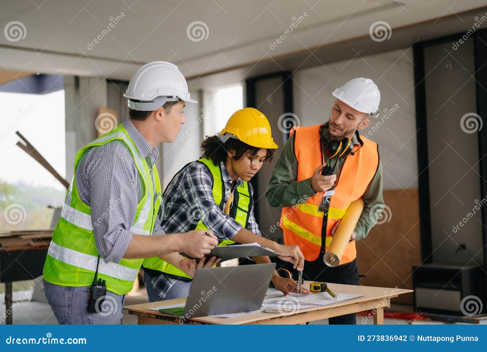 Engineers are Discussing Data Working and Laptop or Tablet with Architectural Project at New ...