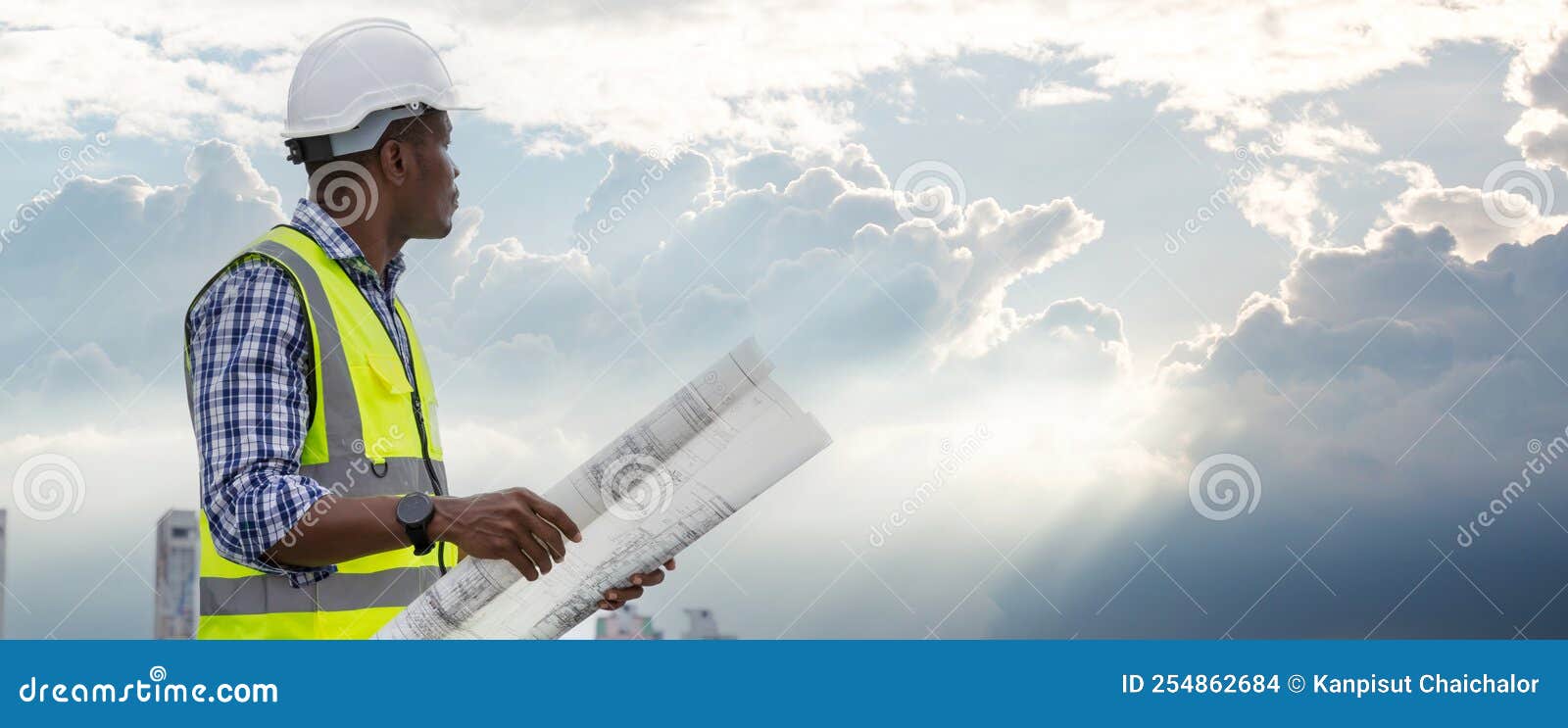 Engineers with Draft Plan of Building on Constructing Site. Engineer ...