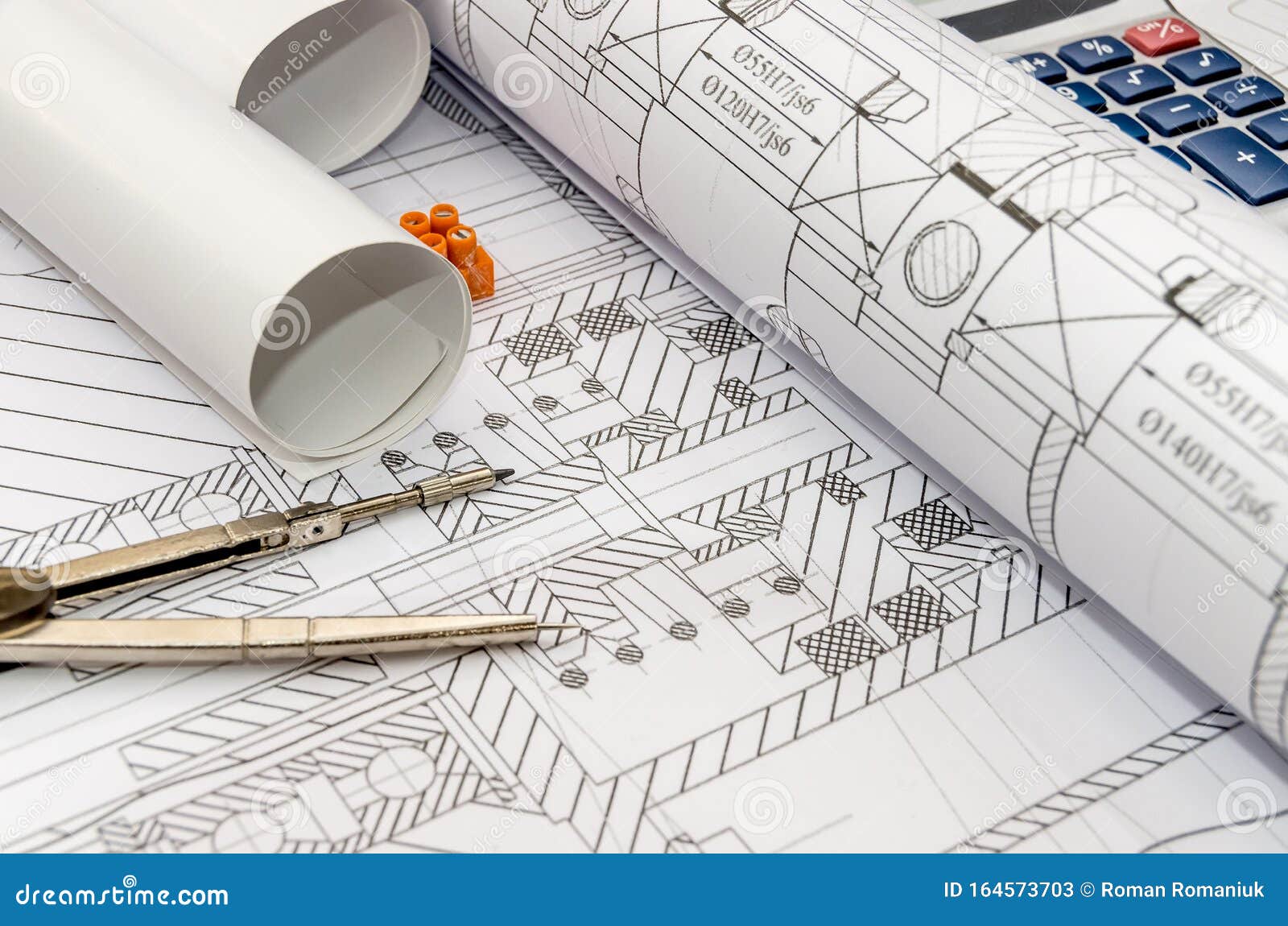 Engineers Drawing with Compass, Calculator and Rolls Stock Image ...