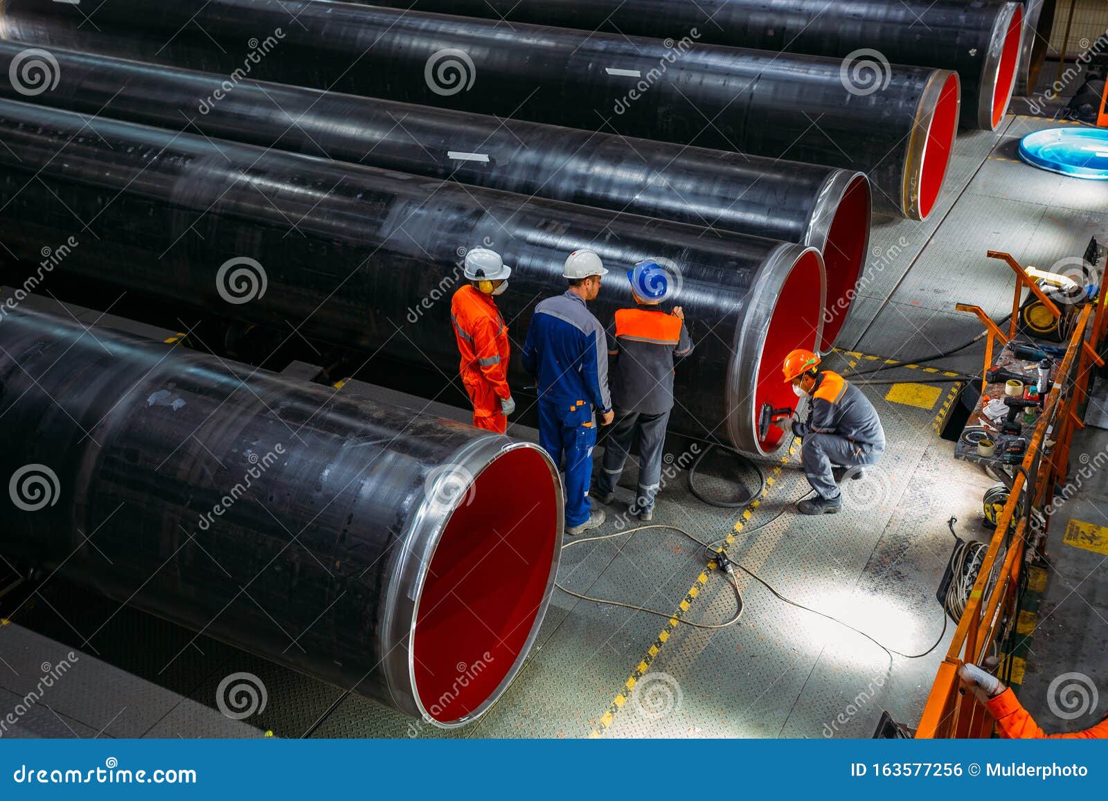 Engineers Examine New Coated Pipe in Factory Editorial Photo - Image of ...