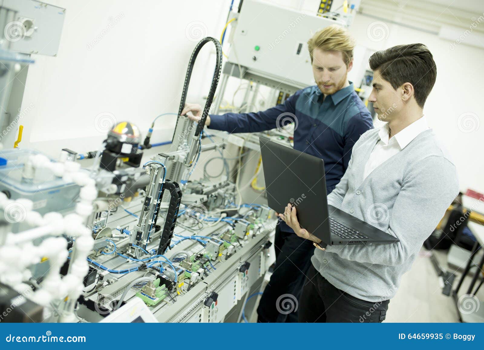 Engineers in the factory stock image. Image of expertise - 64659935
