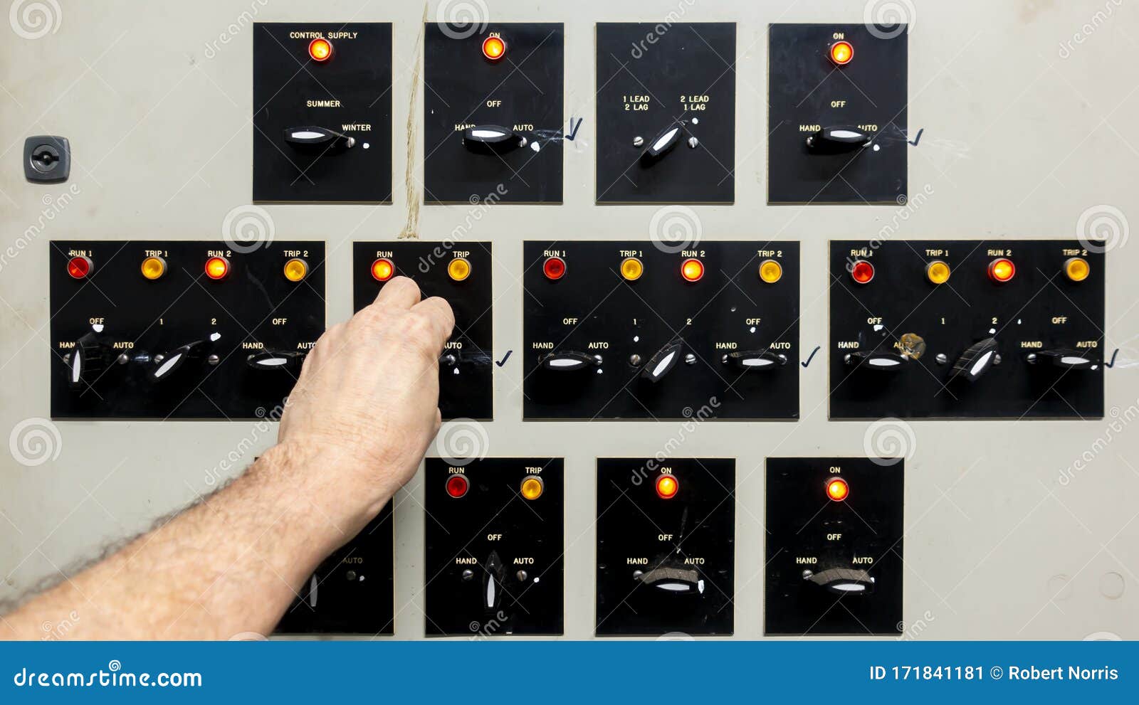 Engineers Hand Adjusting a Very Old Looking Control Panel Stock Image ...