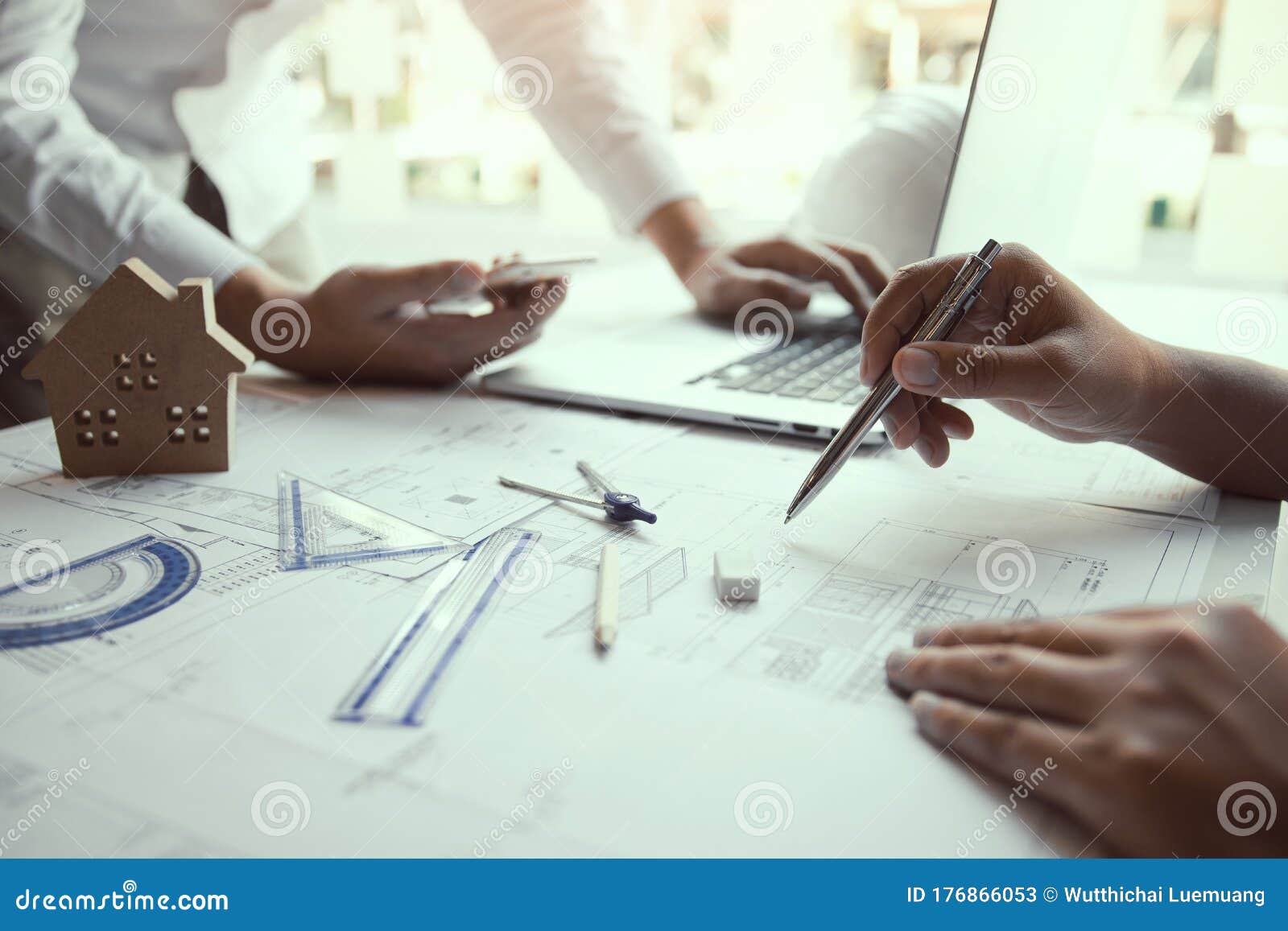 Engineers Are Helping To Design Work On Blueprints And Collaborate On ...