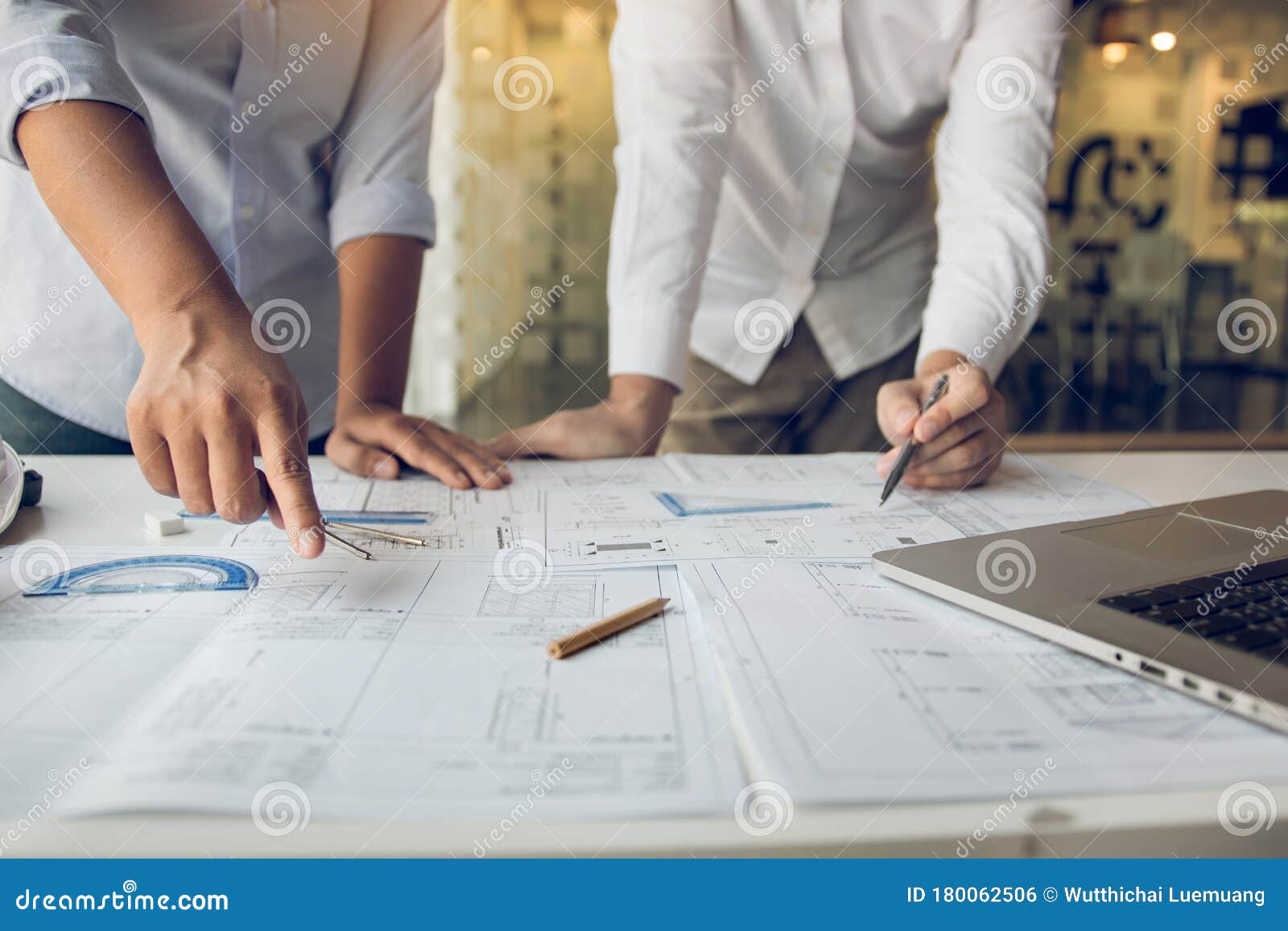 Engineers are Helping To Design Work on Blueprints and Collaborate on ...