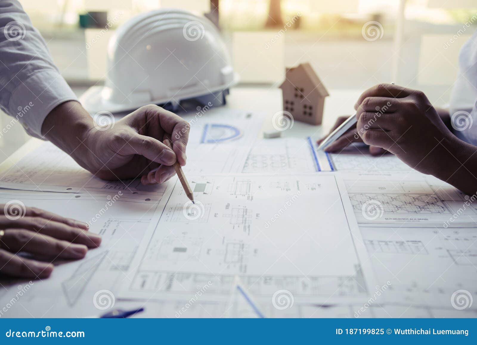 Engineers are Helping To Design Work on Blueprints and Collaborate on ...