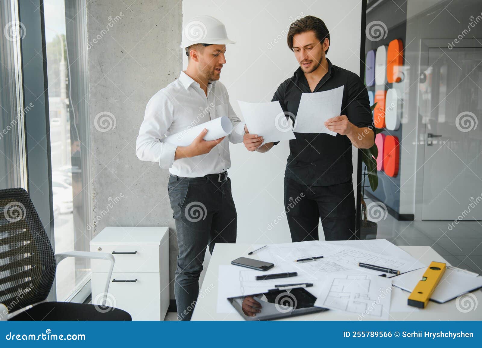 Engineers are Helping To Design Work on Blueprints and Collaborate on ...