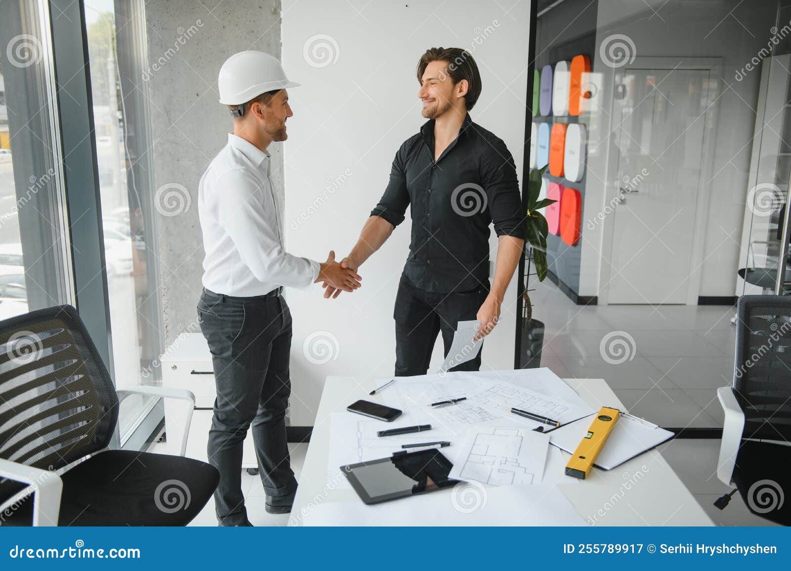 Engineers are Helping To Design Work on Blueprints and Collaborate on ...