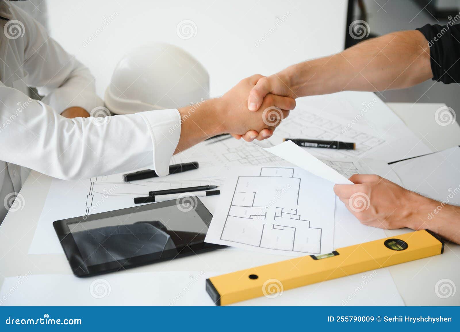 Engineers are Helping To Design Work on Blueprints and Collaborate on ...