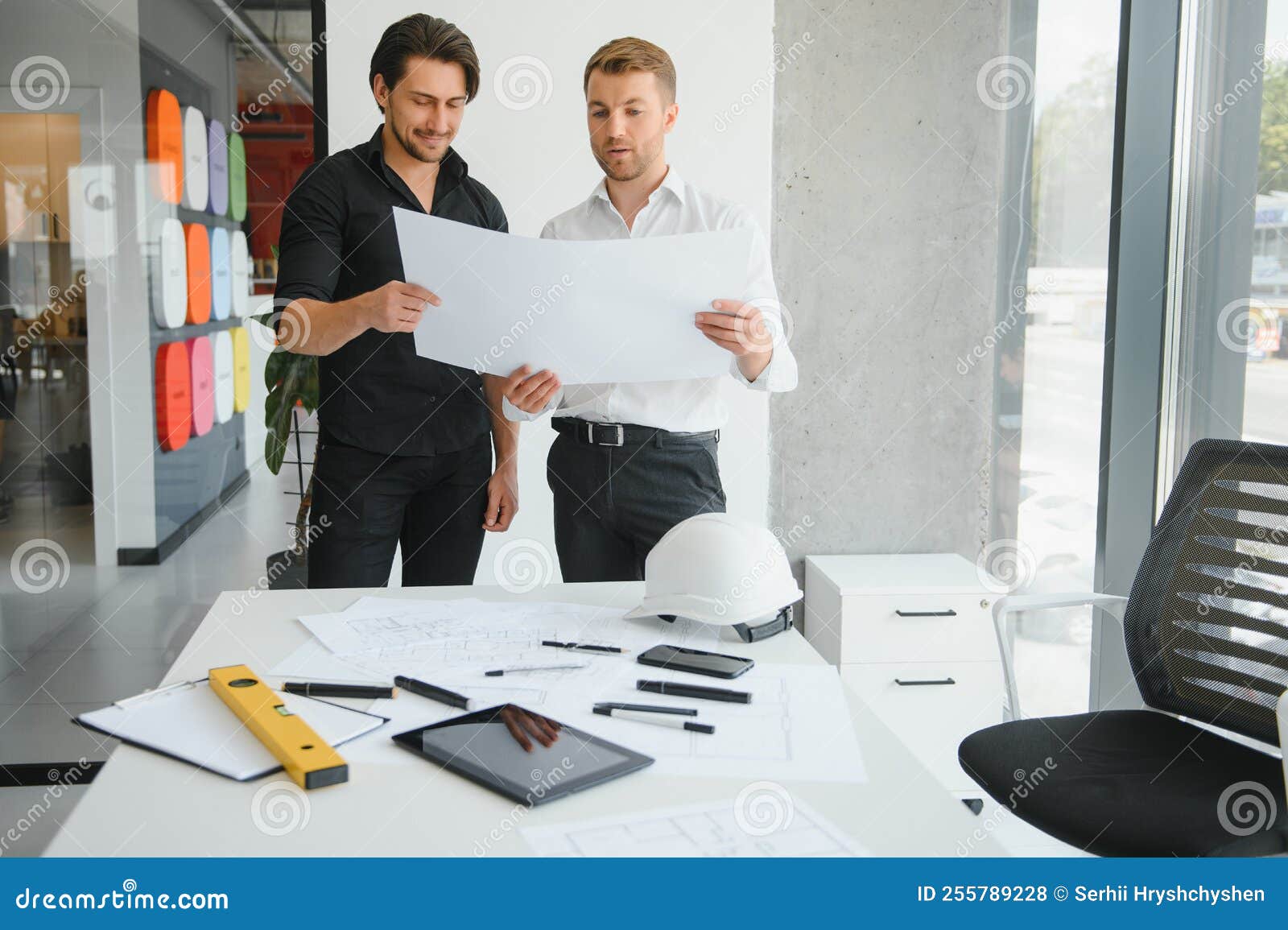 Engineers are Helping To Design Work on Blueprints and Collaborate on ...