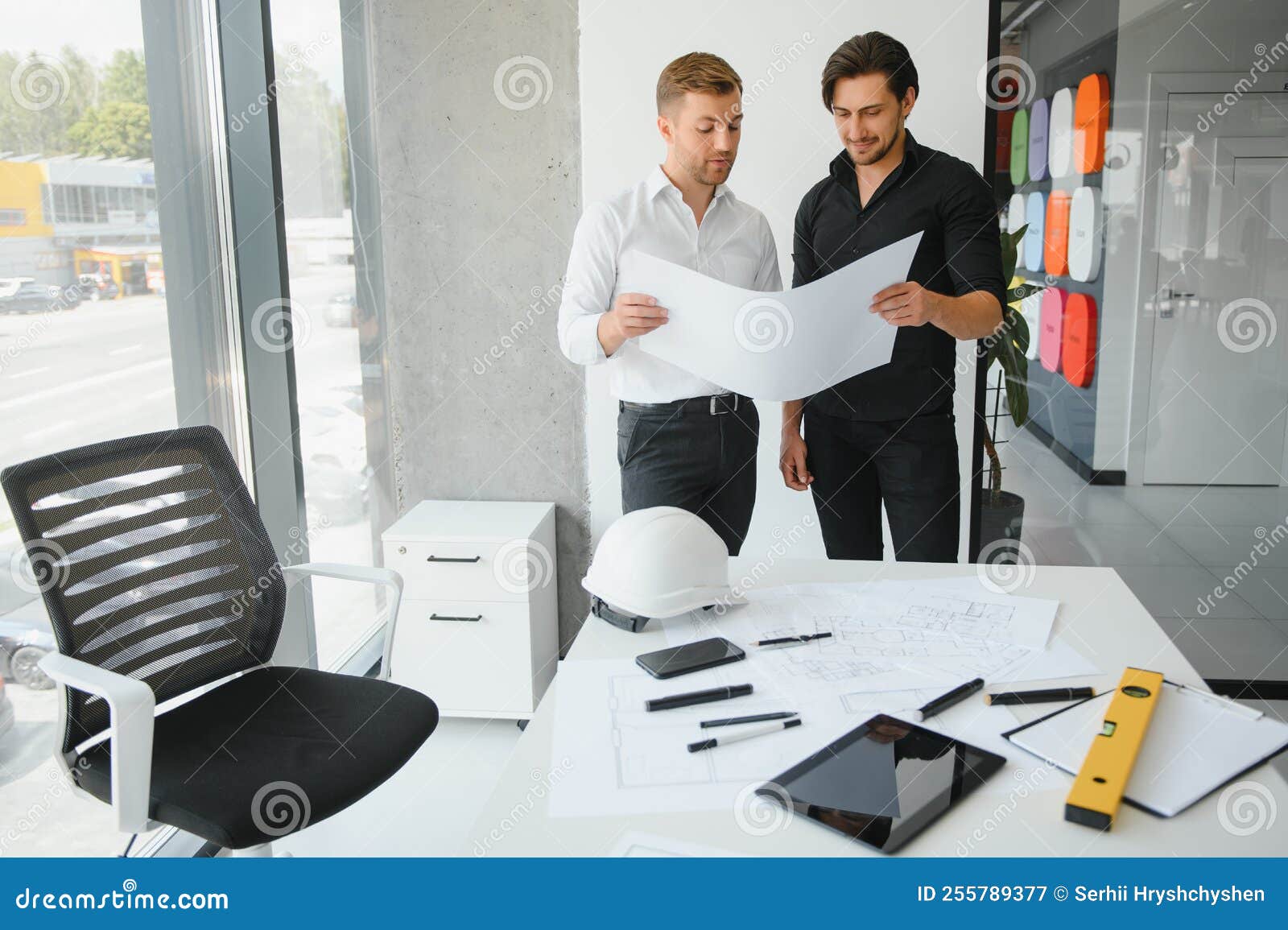 Engineers are Helping To Design Work on Blueprints and Collaborate on ...