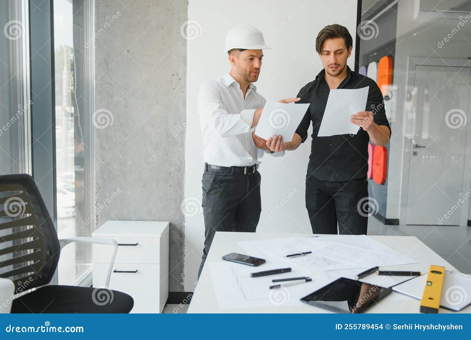 Engineers are Helping To Design Work on Blueprints and Collaborate on Structural Analyzing of ...