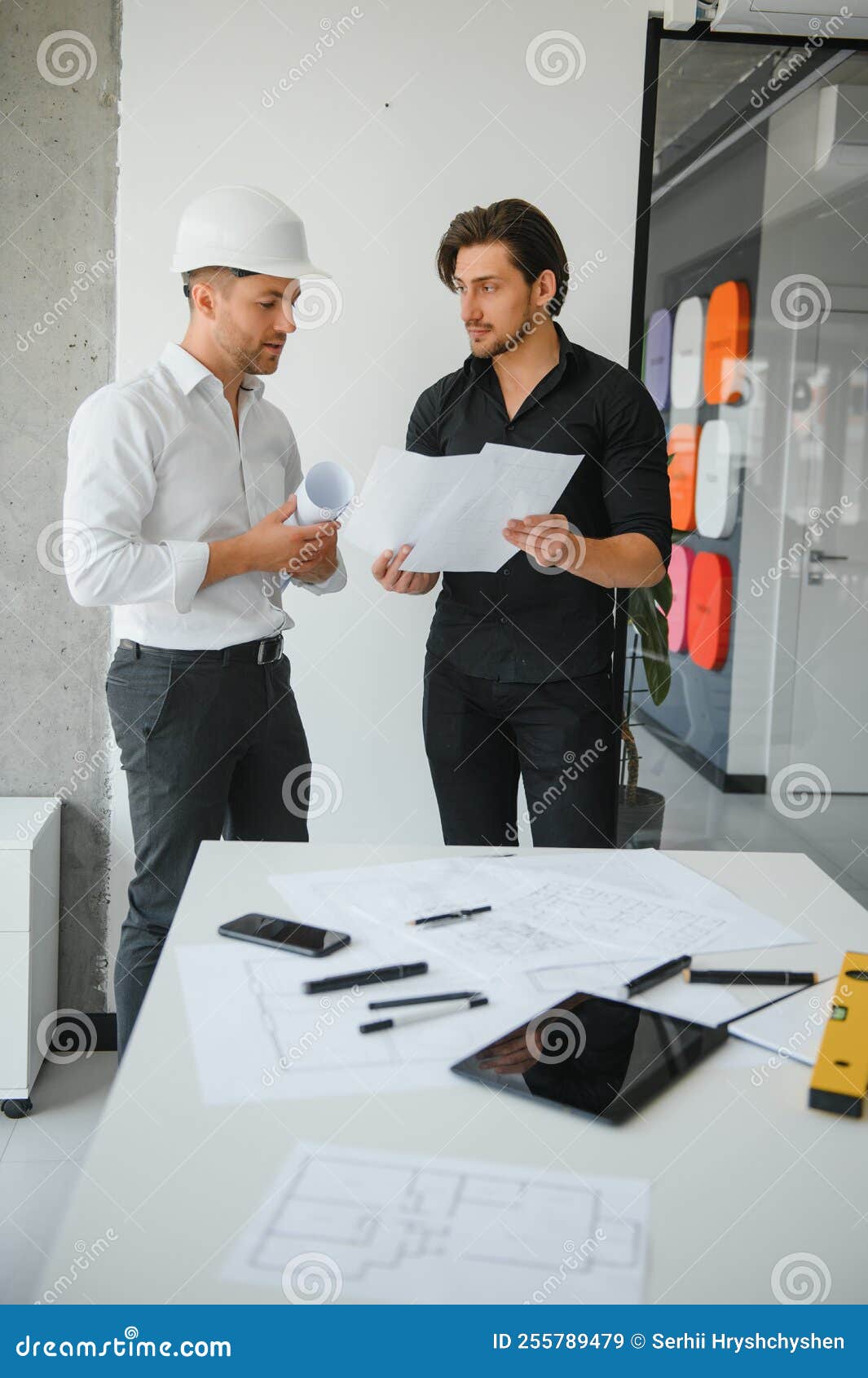 Engineers are Helping To Design Work on Blueprints and Collaborate on ...