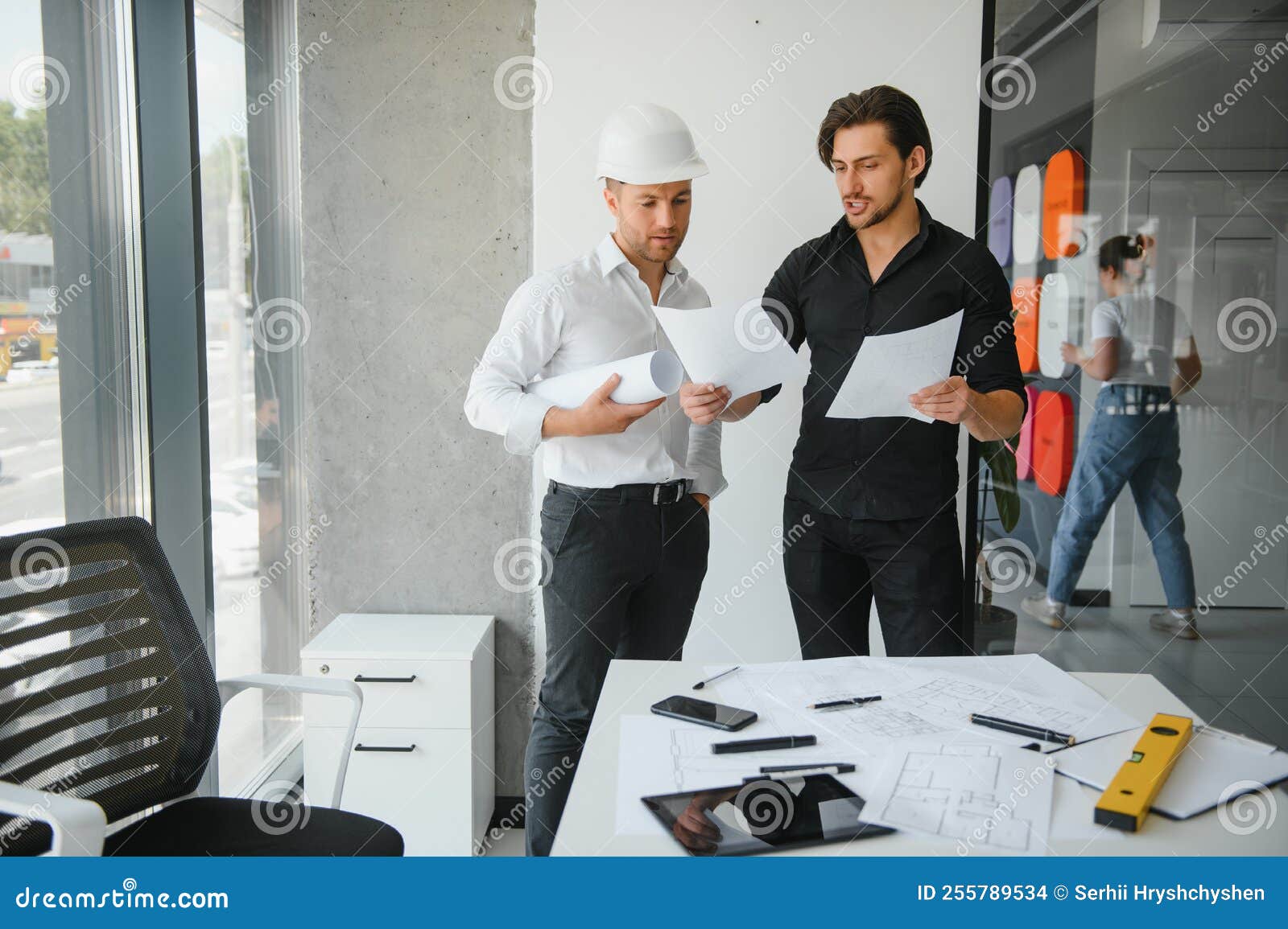 Engineers are Helping To Design Work on Blueprints and Collaborate on ...