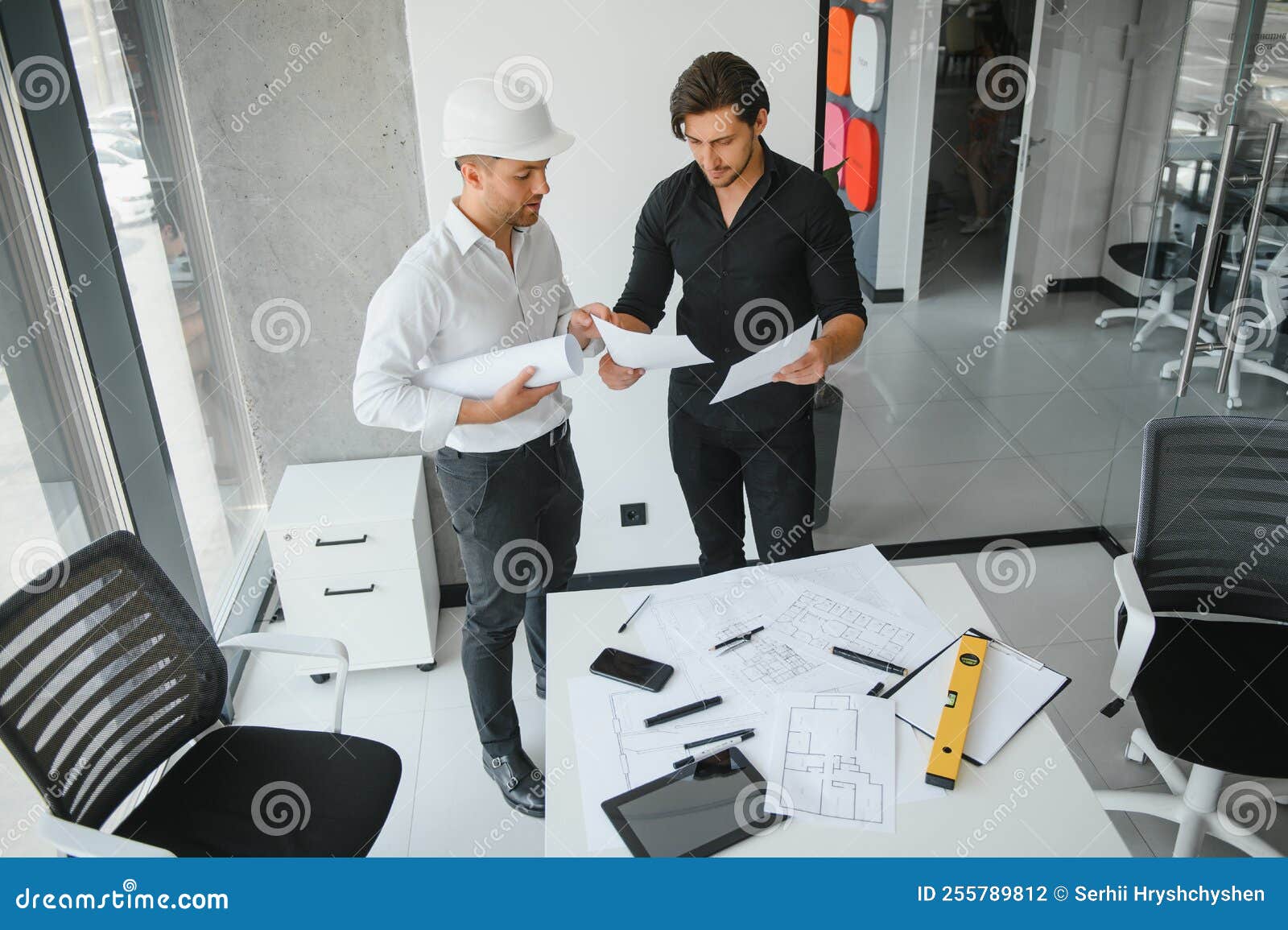 Engineers are Helping To Design Work on Blueprints and Collaborate on ...