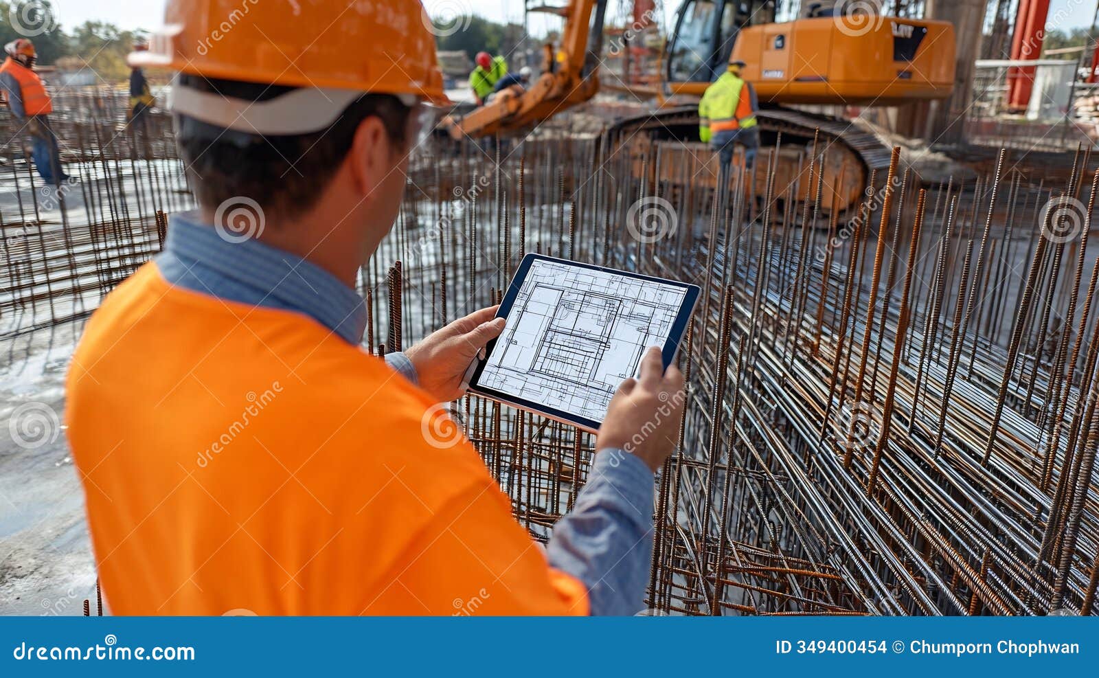 Engineers Inspecting Rebar Installations Referencing Virtual Project ...
