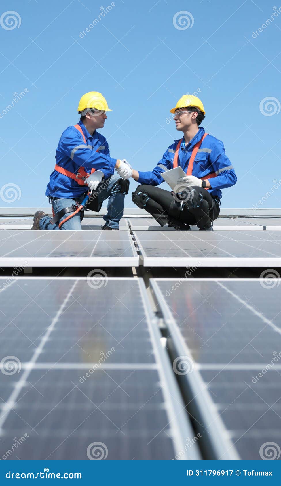 Engineers Install Solae Cell on the Roof of Factory Stock Image - Image ...