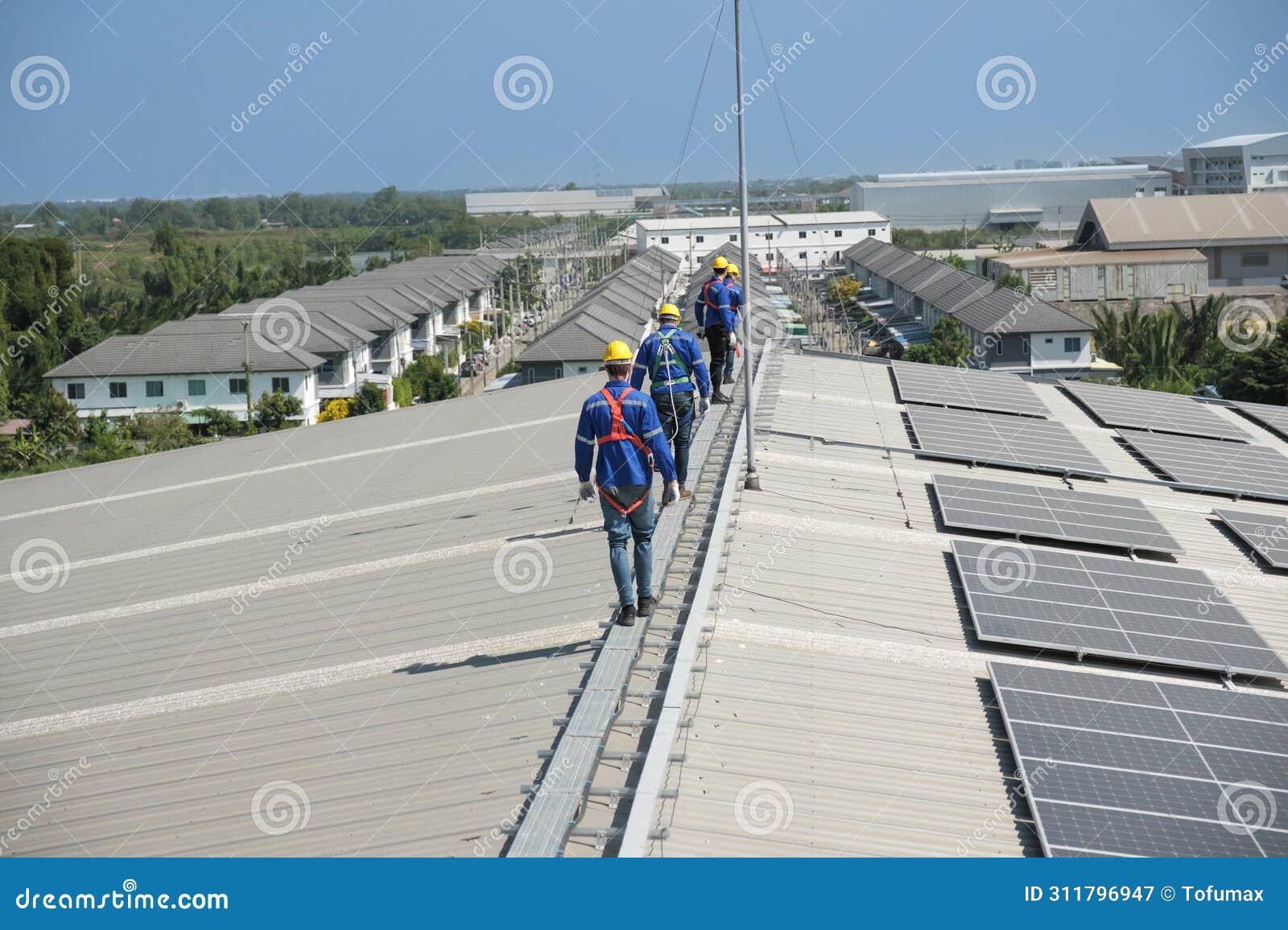 Engineers Install Solae Cell on the Roof of Factory Stock Image - Image ...