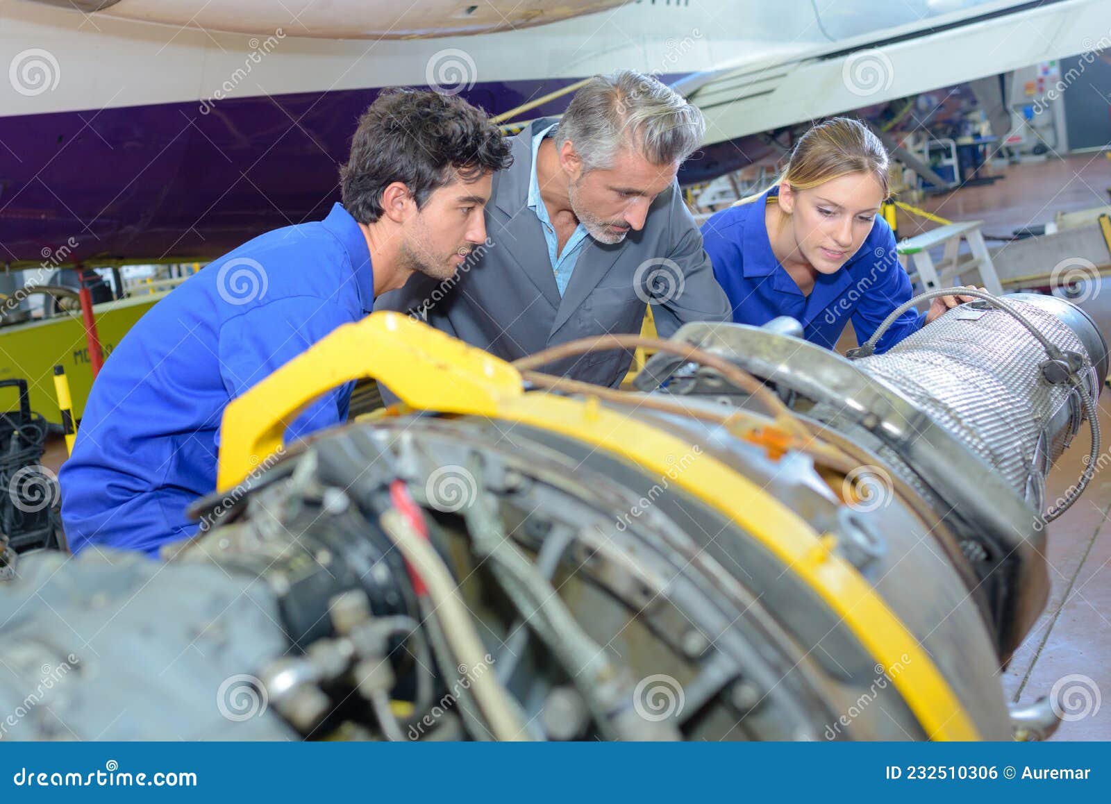 Engineers Looking at Aircraft Component Stock Photo - Image of business ...