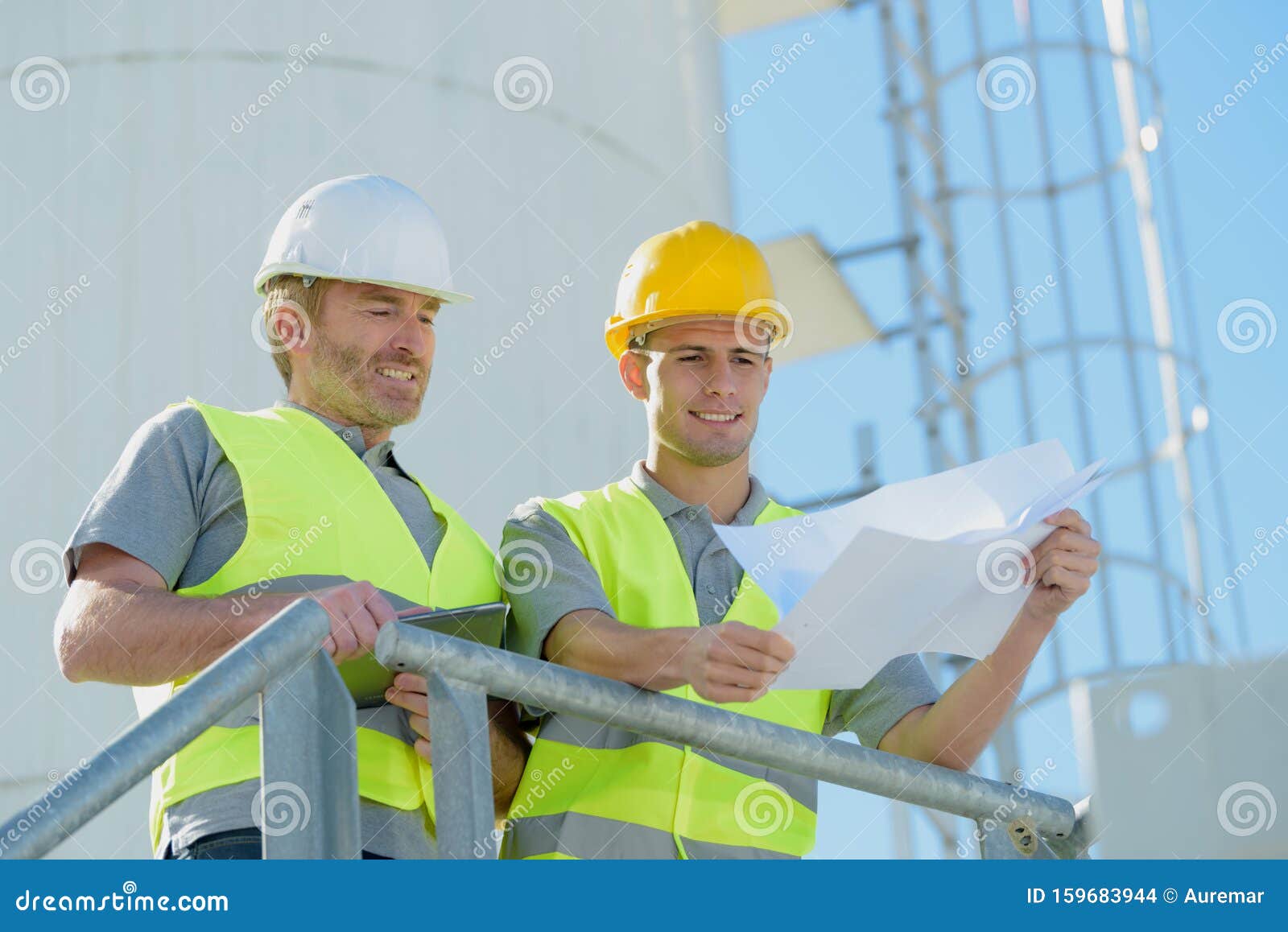 Engineers Looking into Factory from Outside Stock Photo - Image of ...
