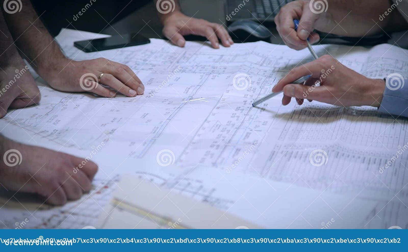 Engineers and Managers in the Conference Room Discuss Drawings and ...
