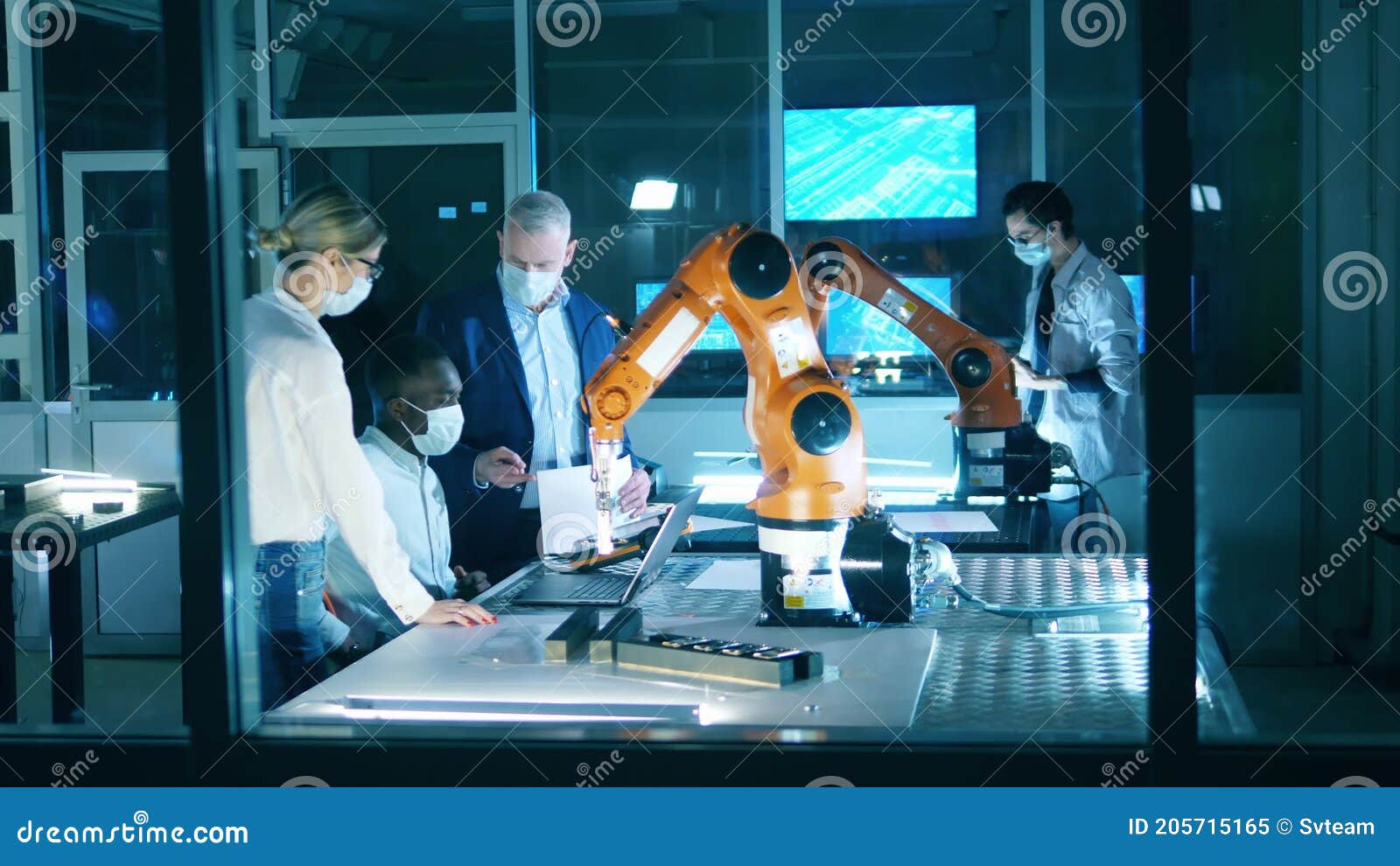 Engineers in Masks Working at Robotics Development Laboratory ...