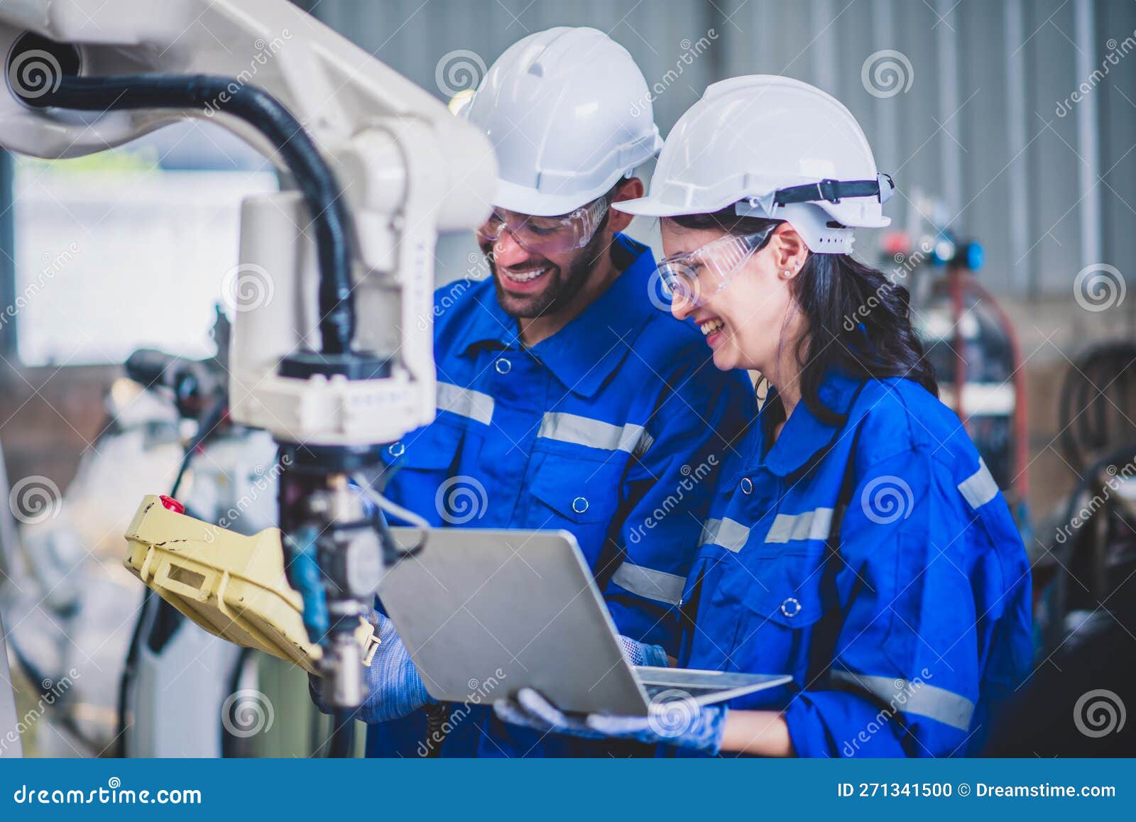 Two Engineers Mechanic Using Computer Controller Robotic Arm for ...