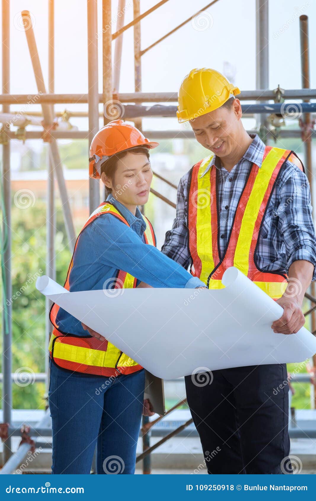 Engineers are Meeting, Working and Looking at Home Blueprint in Stock ...