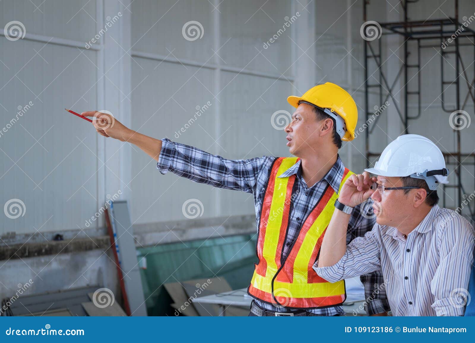 Engineers are Meeting, Working and Looking at Point Up in the Work ...