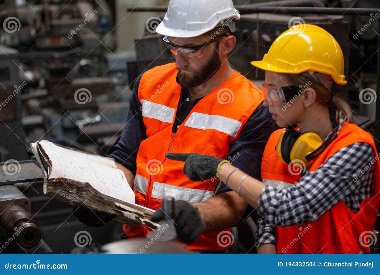 Engineers Operating a Cnc Machine in Factory Stock Photo - Image of ...