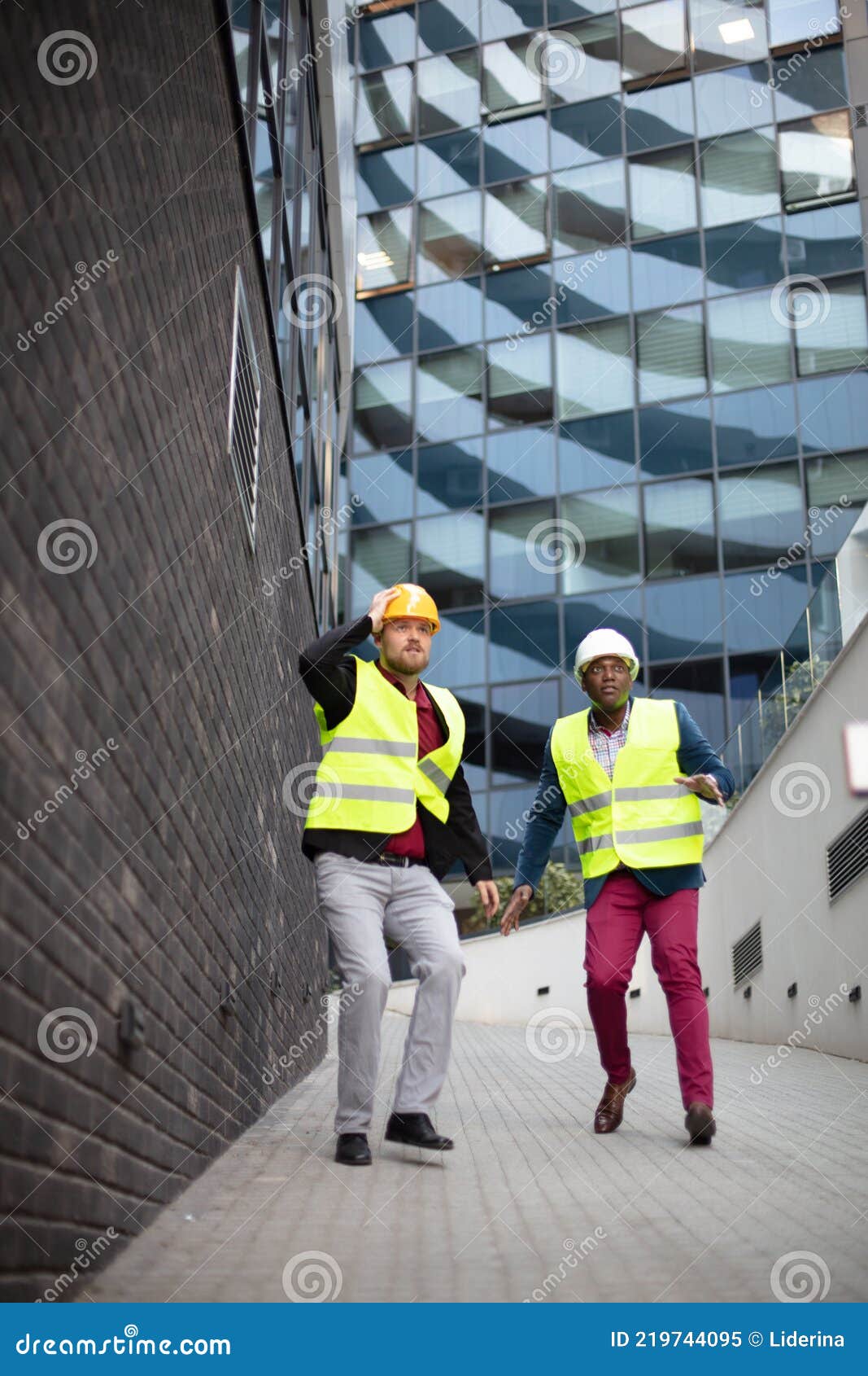 Engineers in danger stock image. Image of architect - 219744095