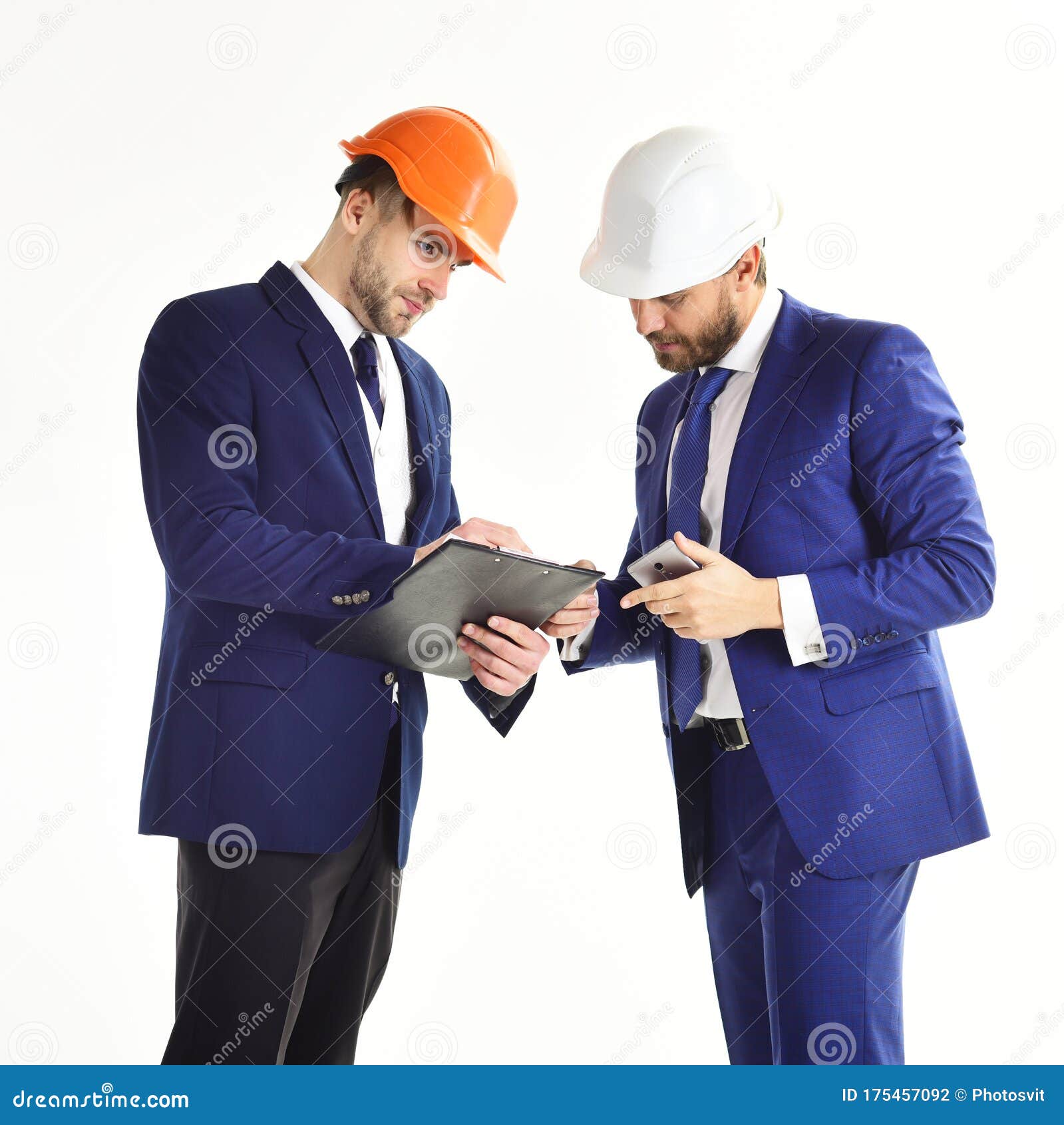 Engineers with Serious Faces. Entrepreneur and Architect with Plans and ...