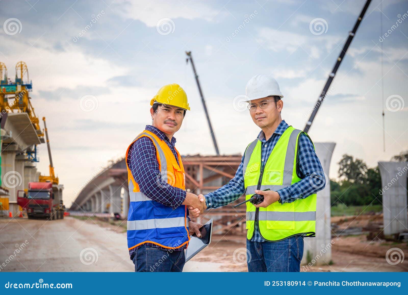 Engineers Shaking Hands at Construction Site, Construction Worker in ...
