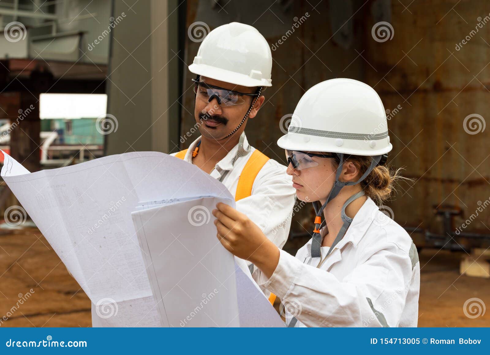 The Engineers at the Shipyard Stock Image - Image of dock, helmet ...