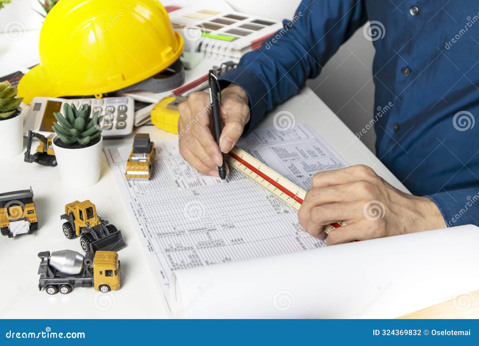 Engineers Sit and Work on Building Design and System Work.,construction ...