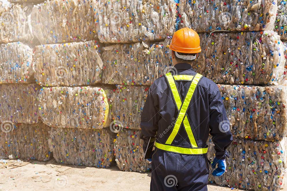 Engineers are Sorting Out Recycled Plastic Waste. Engineer Looking ...