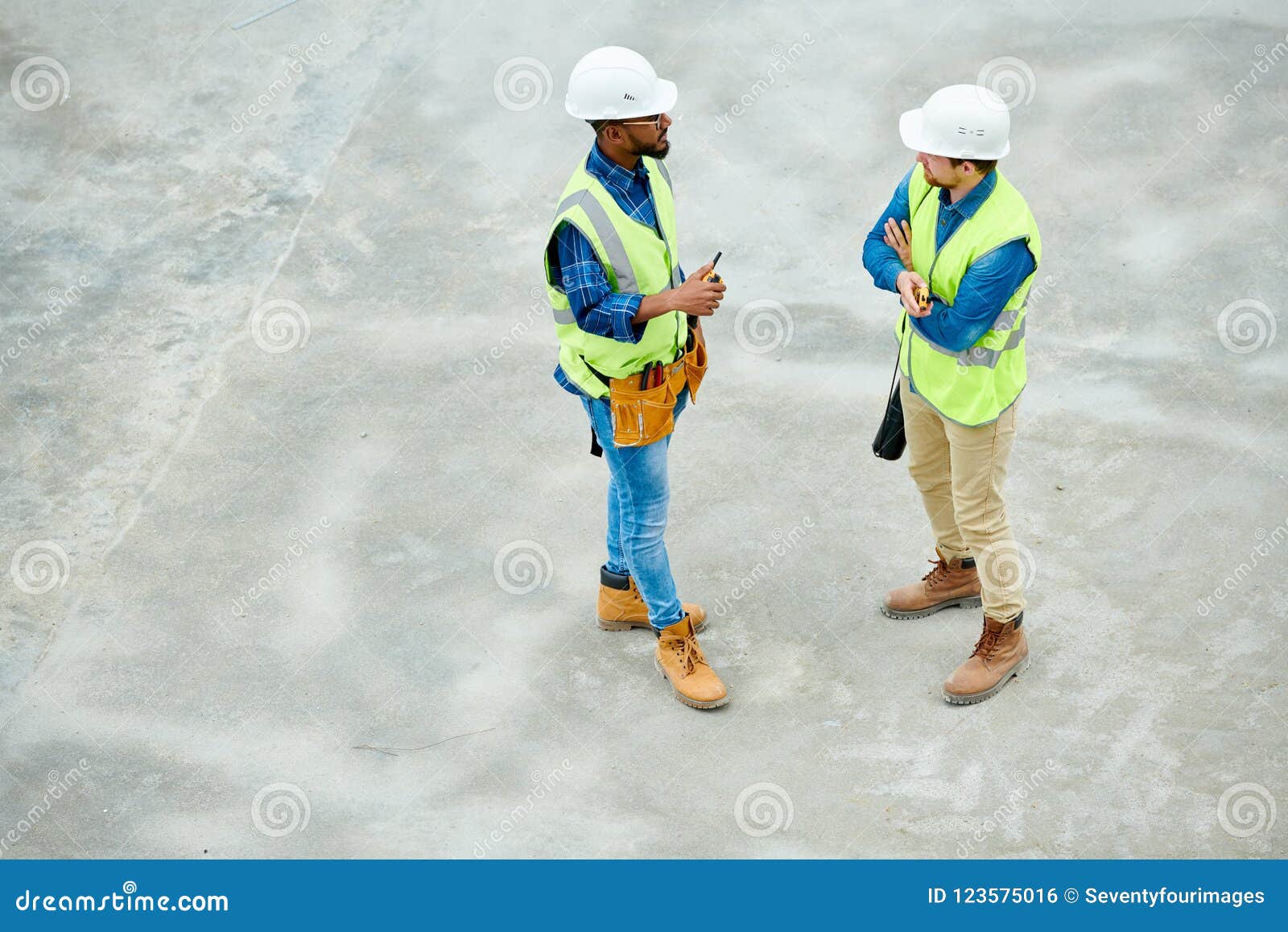 Engineers Speaking on Construction Site Stock Photo - Image of speaking ...