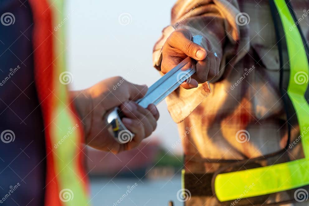 Engineers are Submitting Equipment To Workers. Concepts of Teamwork and ...