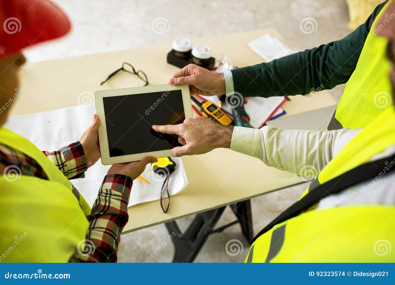 Engineers with Tablet at Construction Site Stock Photo - Image of ...