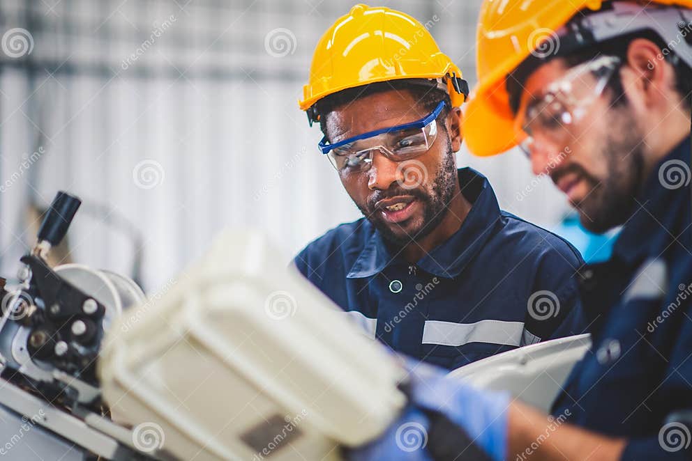 Engineers Team Mechanic Using Computer Controller Robotic Arm for ...